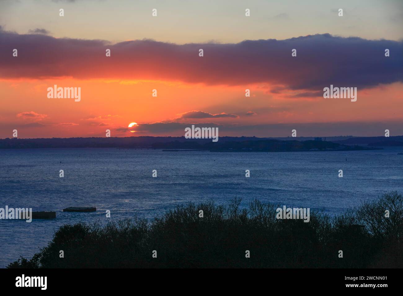 View at sunset from the Pointe de l'Armorique over the bay Rade de ...