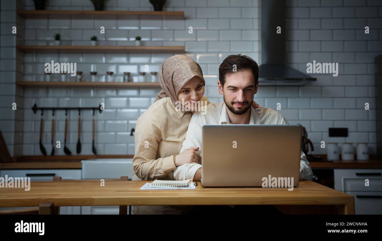 Man comes home hugs family hi-res stock photography and images - Alamy