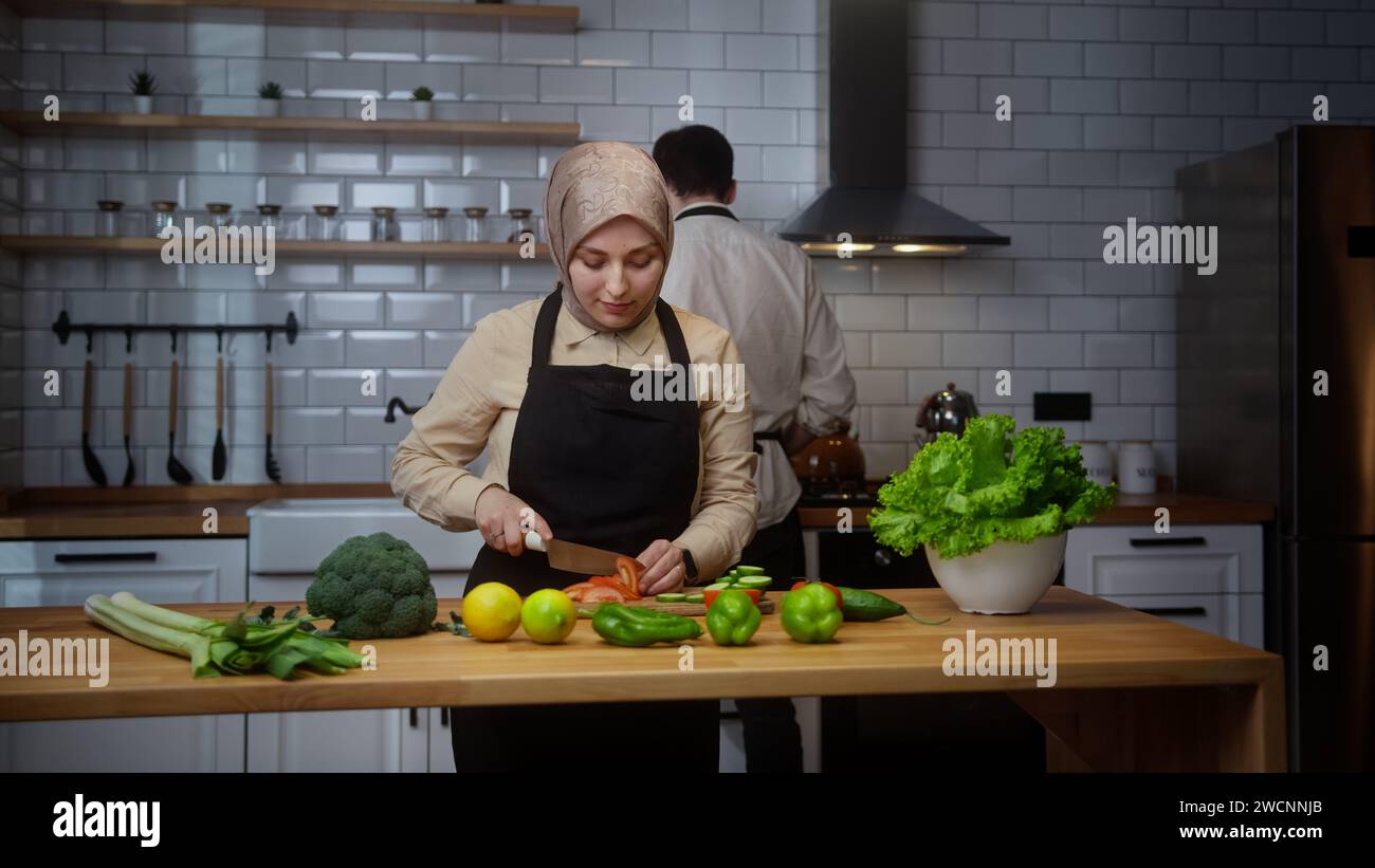 Young loving couple enjoy conversation in the modern kitchen and ...