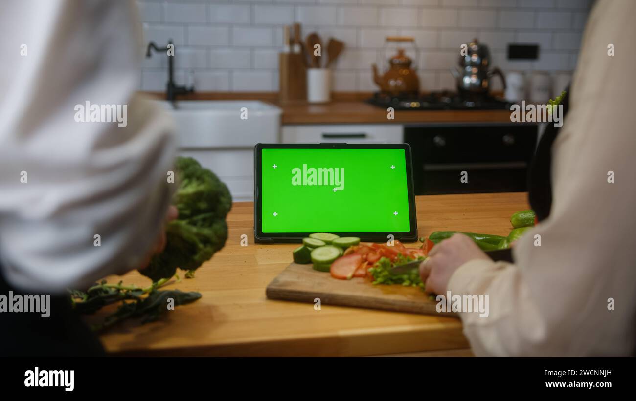 A tablet device with mock up green screen chroma key display on the ...