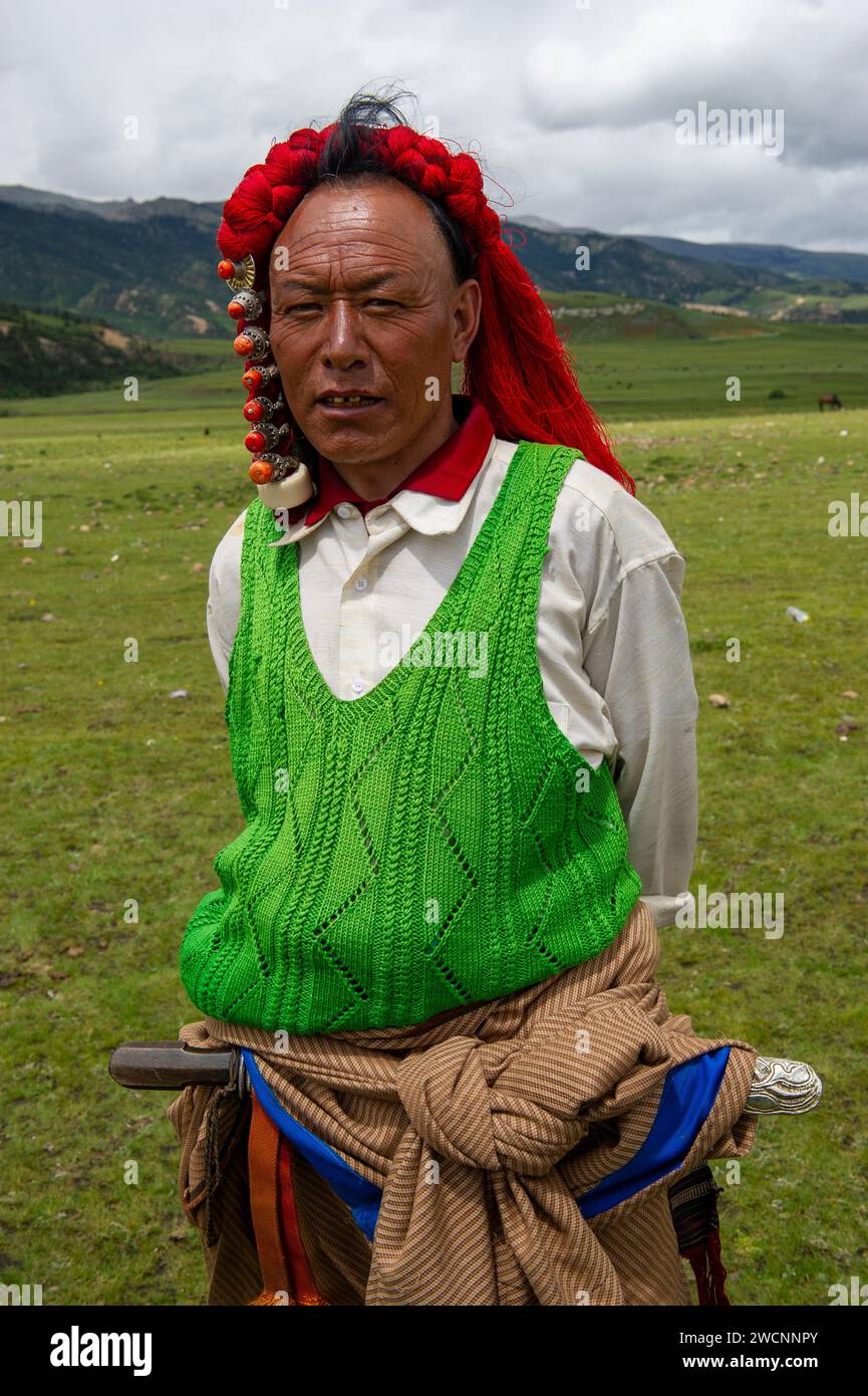 Tibet, Kham, Litang. A male nomad competitor at a horse festival ...
