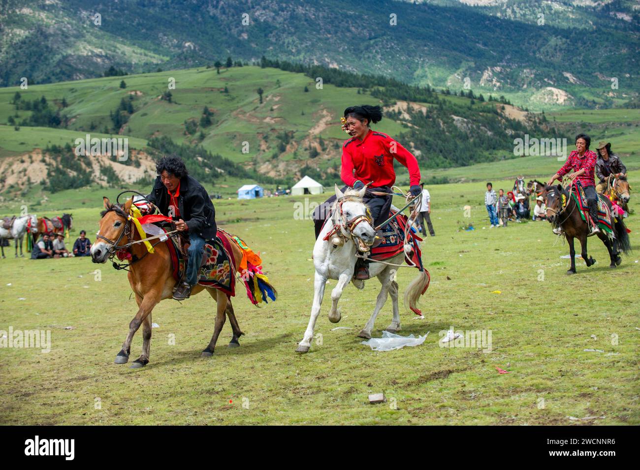 Tibet, Kham, Litang. Nomads at horse festival Stock Photo - Alamy