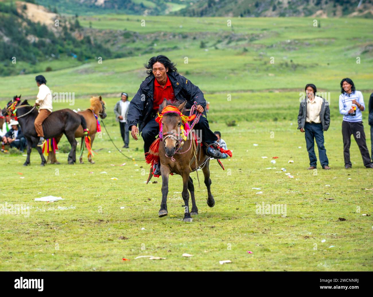 Tibet, Kham, Litang. Nomads at horse festival Stock Photo - Alamy