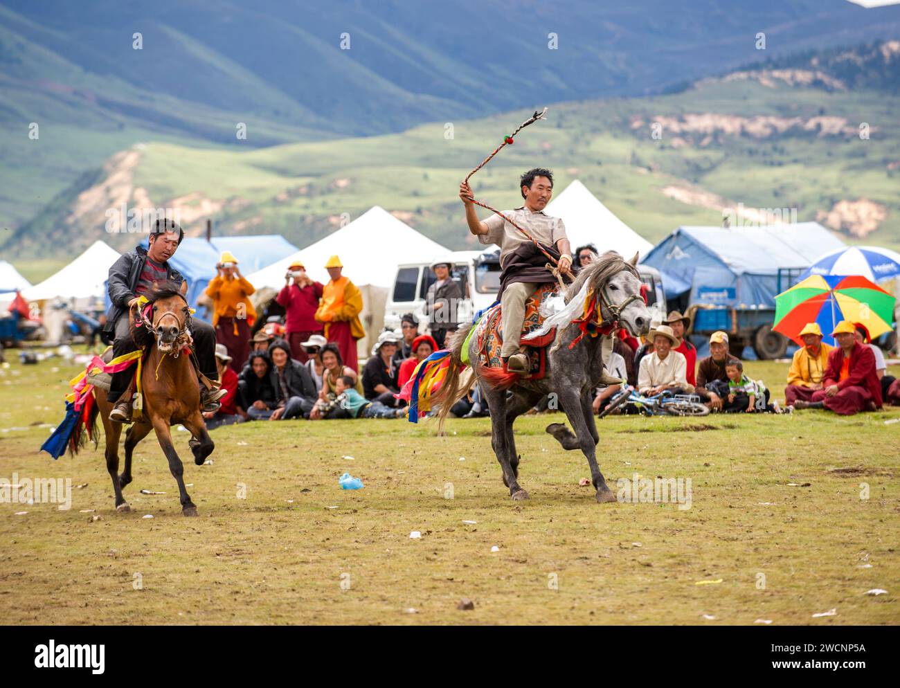 Tibet, Kham, Litang. Nomads at horse festival Stock Photo - Alamy