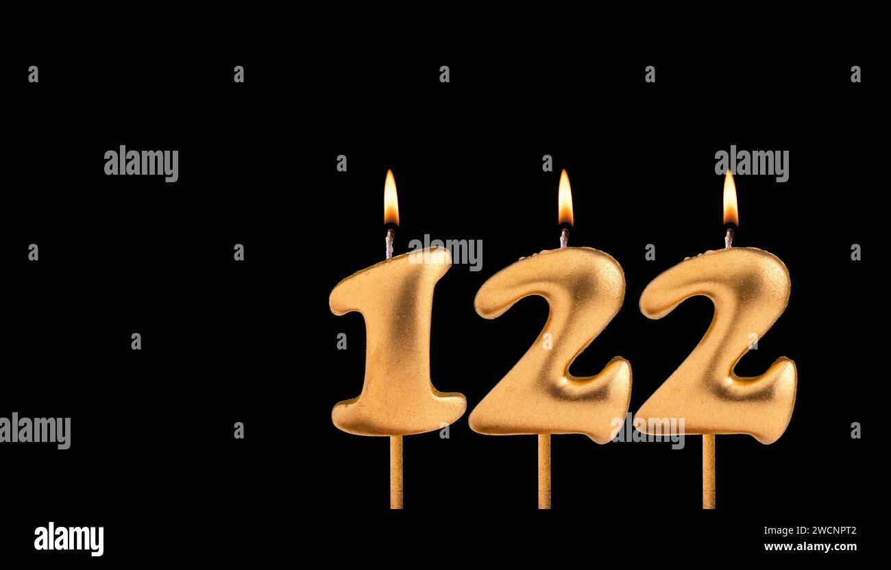Birthday candle number 122 - Birthday celebration on black background ...