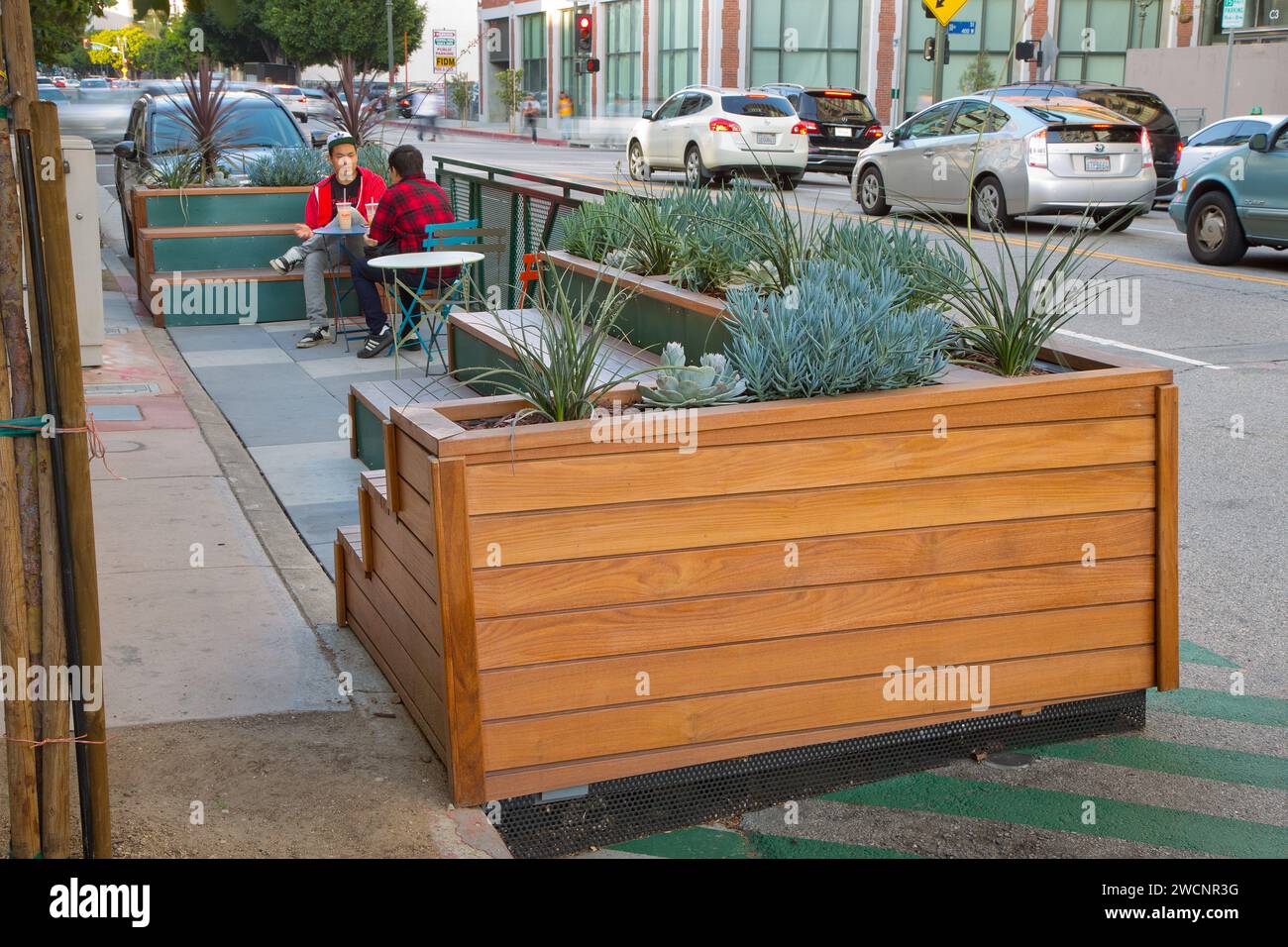 Converting on street parking spaces hi-res stock photography and images - Alamy