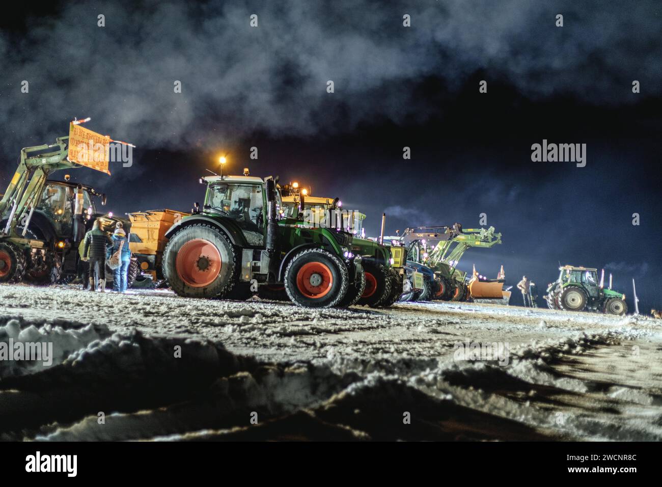 Tractors during a rally as part of the farmers' protests on the snow ...