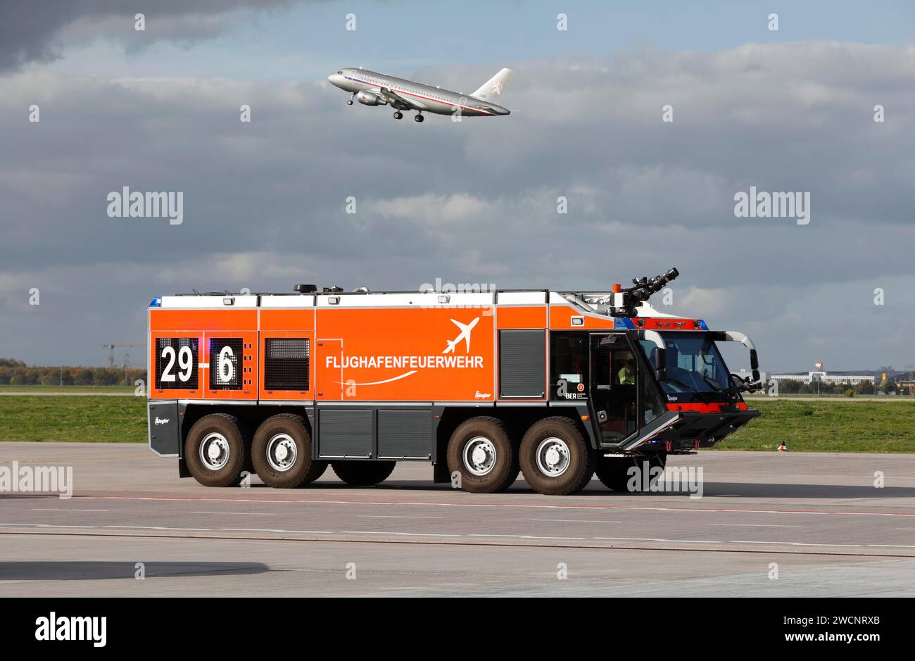 Airport fire brigade fire engine on the BER tarmac during an EASA ...