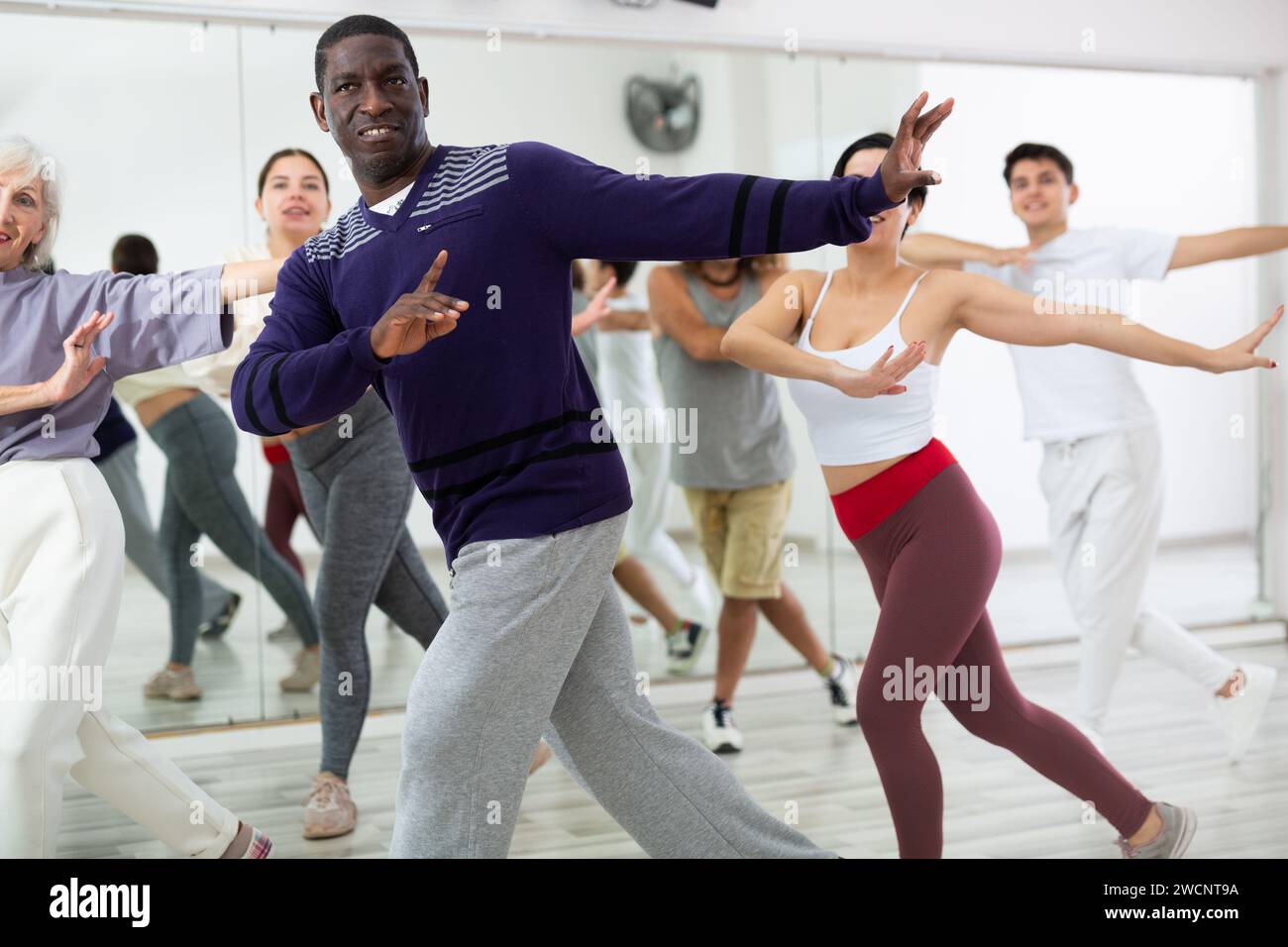Cheerful african american man enjoying active dancing in studio Stock ...