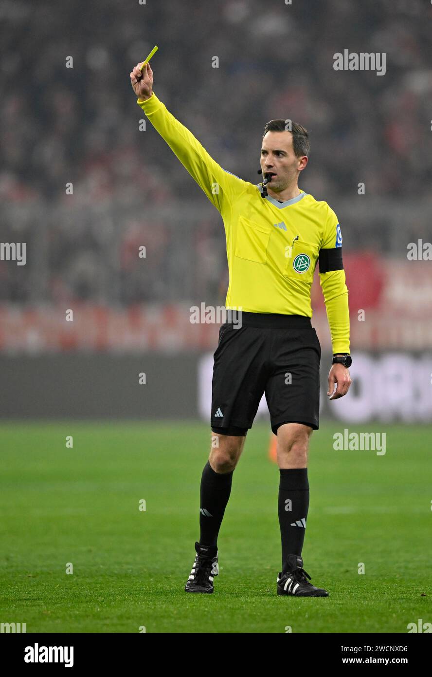 Referee Benjamin Brand shows yellow card, yellow, caution, Allianz ...