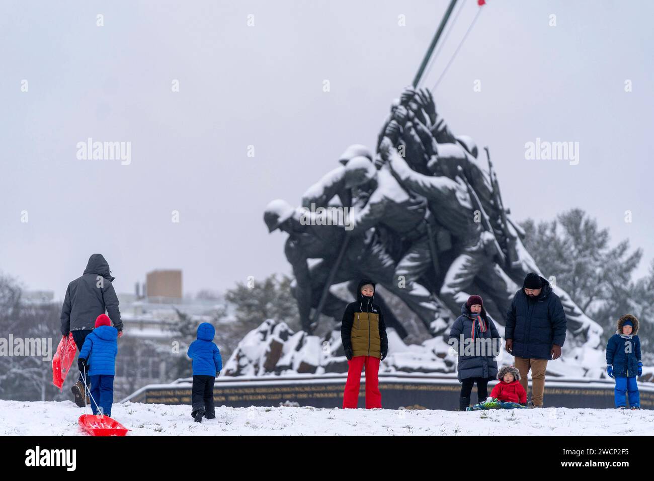 Arlington, United States. 16th Jan, 2024. Families look on as children ...