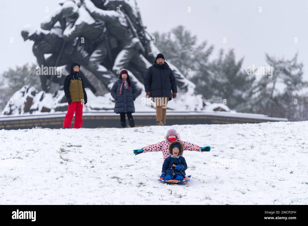Arlington, United States. 16th Jan, 2024. Families look on as children ...