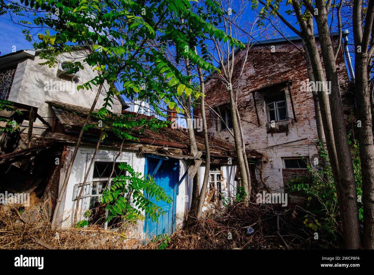 Old shabby abandoned houses in the slum district Stock Photo - Alamy