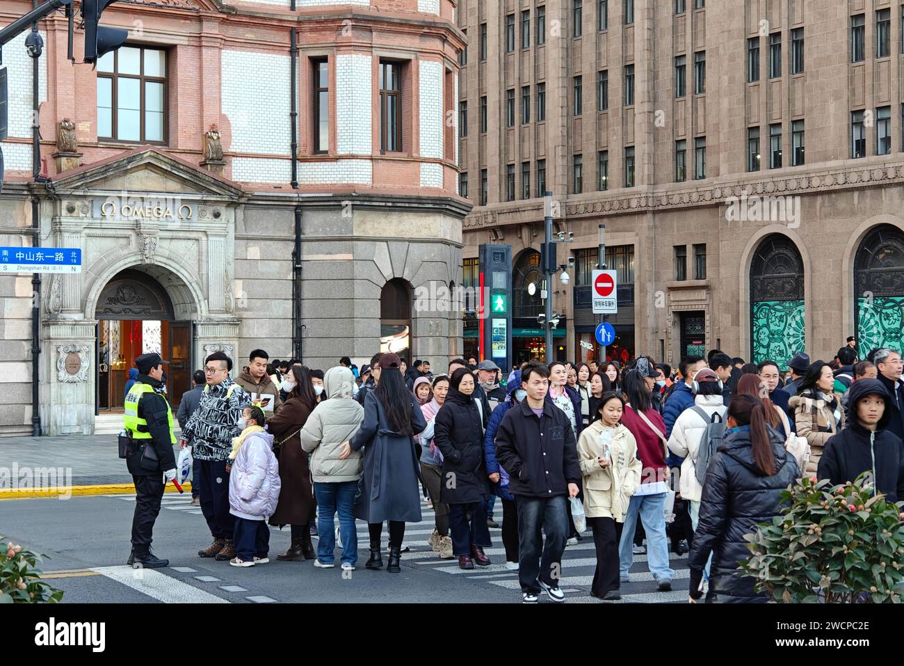 SHANGHAI, CHINA - JANUARY 16, 2024 - Tourists enjoy the Bund and ...