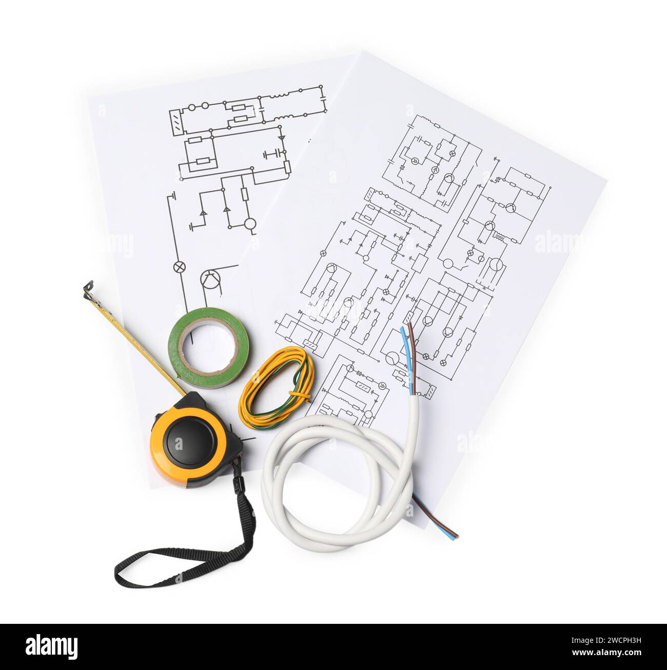 Wiring diagrams, wires and tape measure isolated on white, top view ...