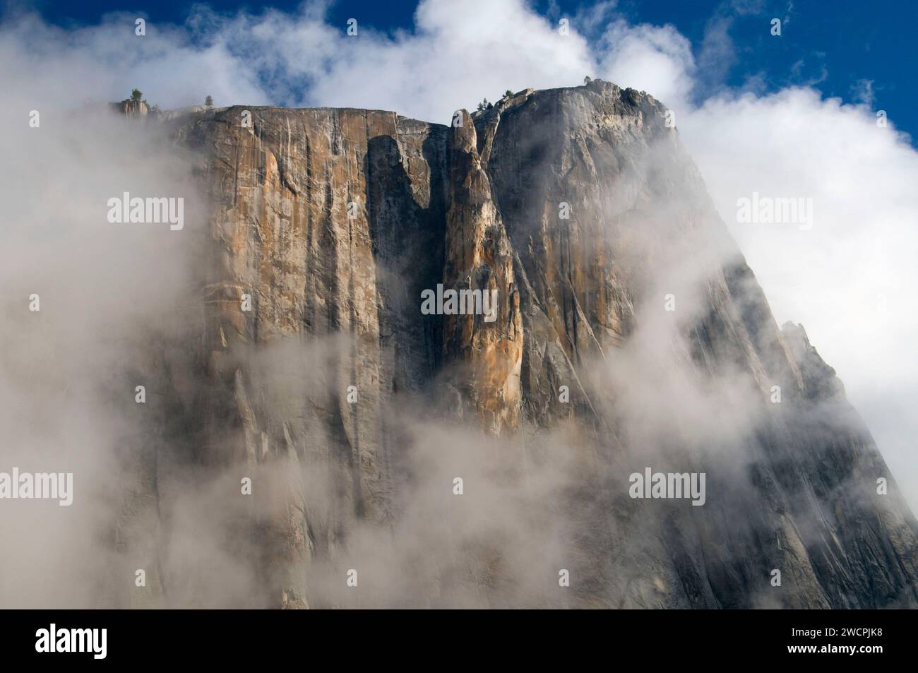 Cliff in clouds from Yosemite Falls Trail, Yosemite National Park ...