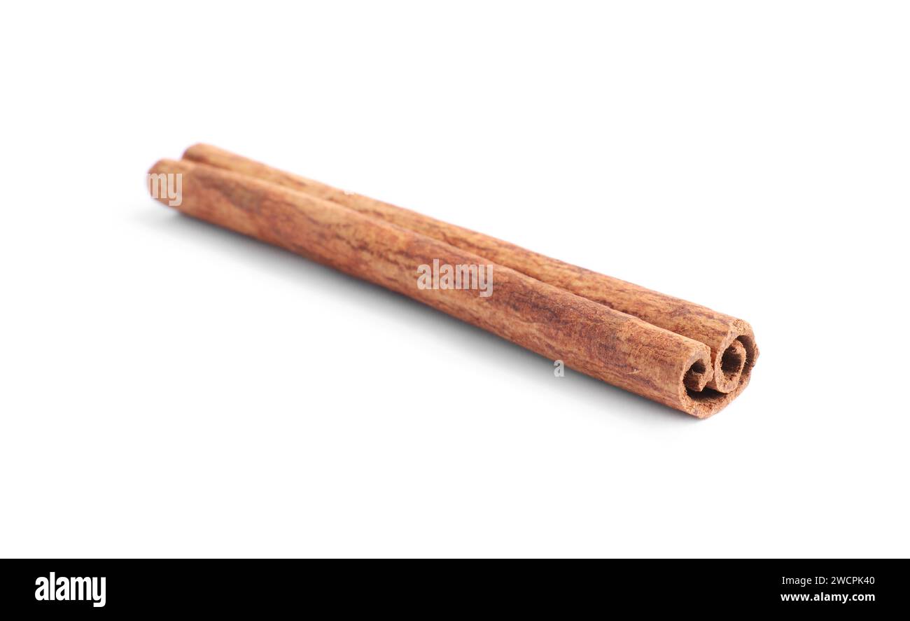 Dry aromatic cinnamon stick isolated on white Stock Photo - Alamy