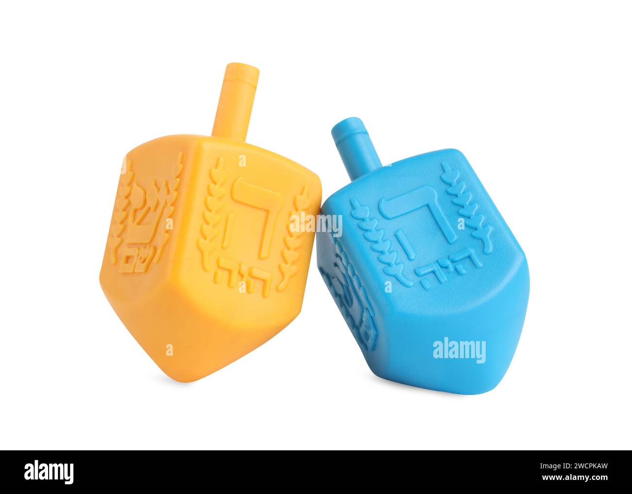 Hanukkah celebration. Colorful dreidels with jewish letters isolated on ...