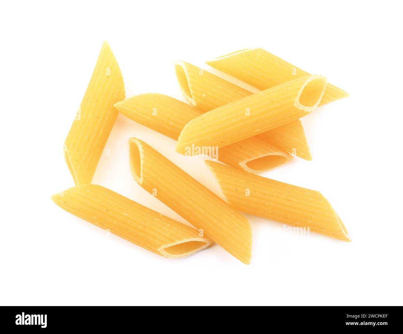 Raw penne pasta isolated on white, top view Stock Photo - Alamy