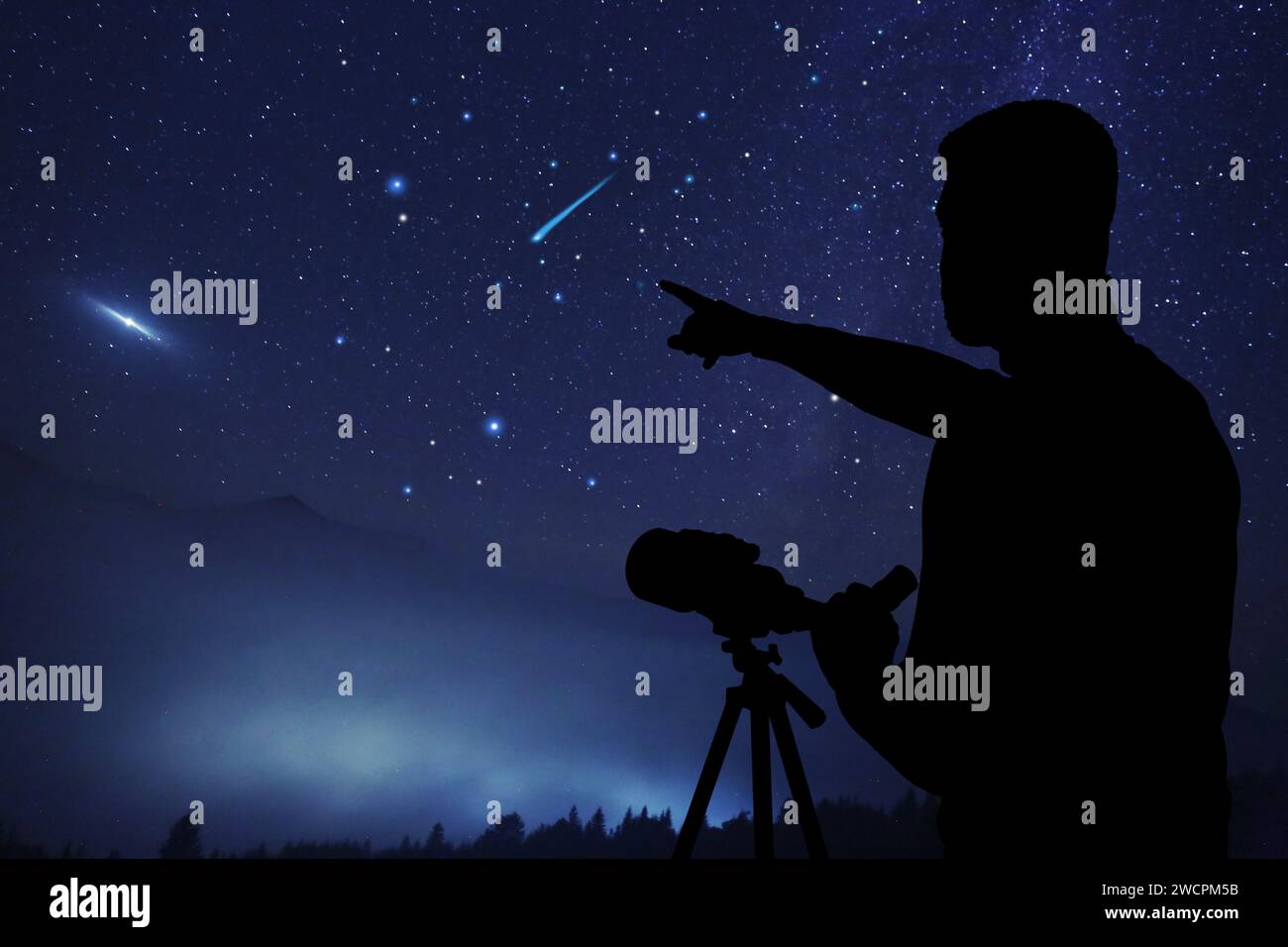 Astronomer with telescope pointing at shooting star outdoors Stock ...