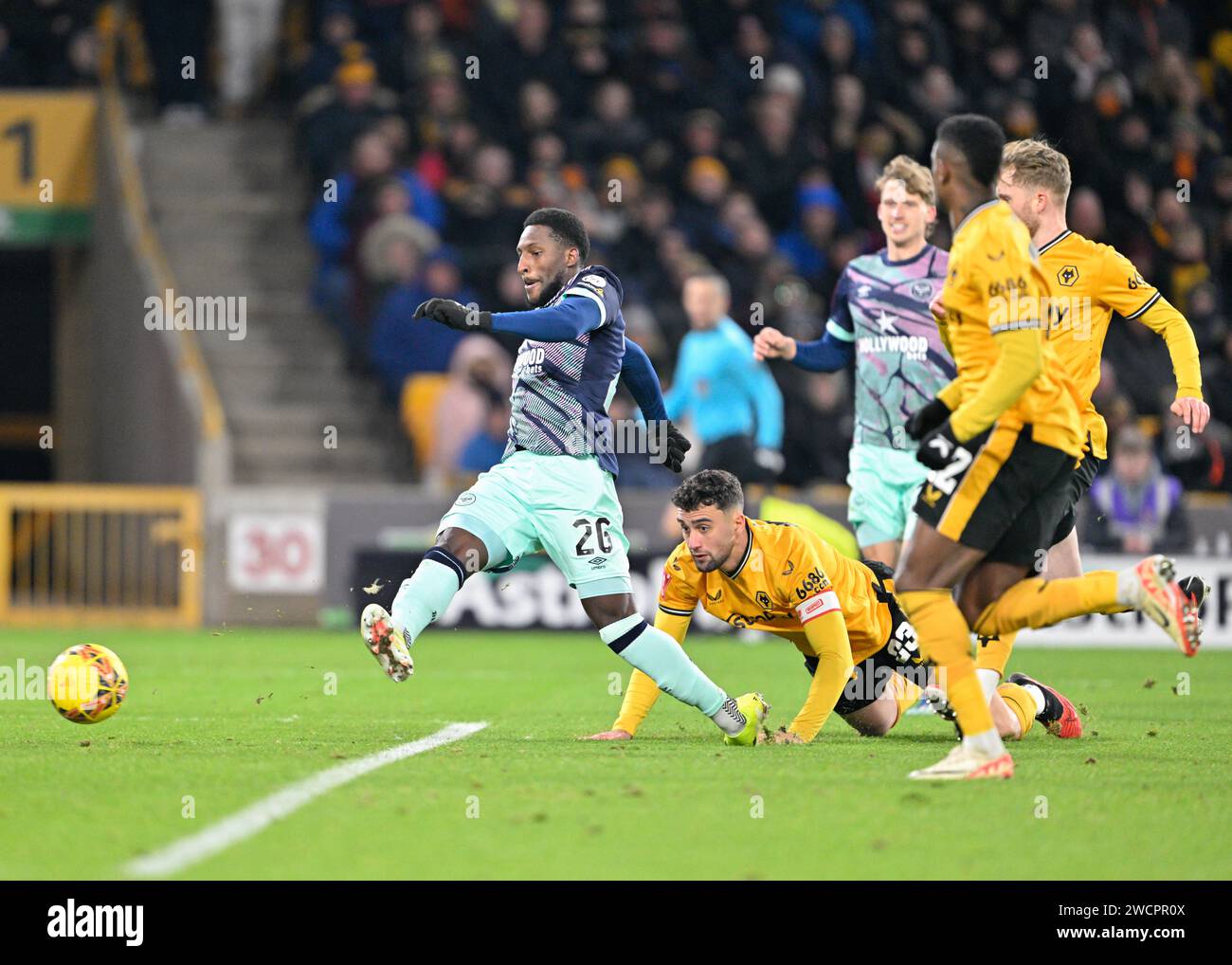 Wolverhampton, UK. 16th Jan, 2024. Shandon Baptiste of Brentford takes ...