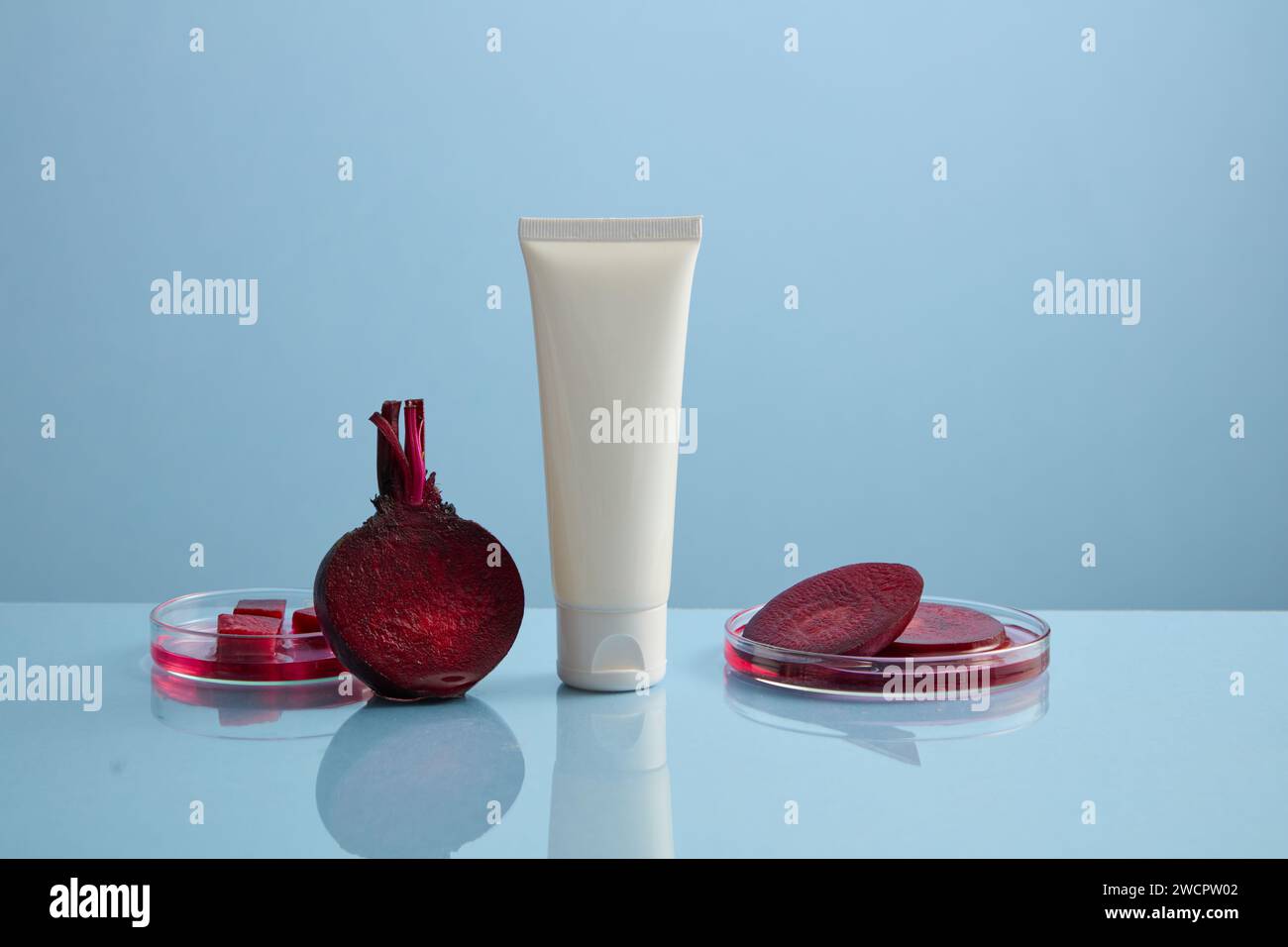 Blue background featured a half of Beetroot and unbranded tube ...