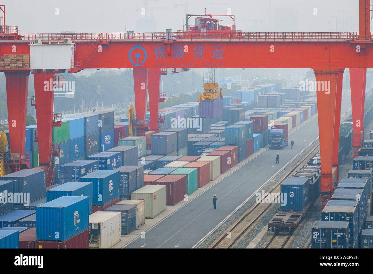 NANJING, CHINA - JANUARY 14, 2024 - A staff member operates a gantry ...