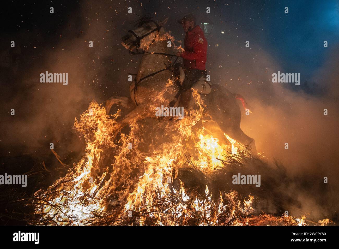 San Bartolome De Pinares, Spain. 16th Jan, 2024. A horse rider jumps ...