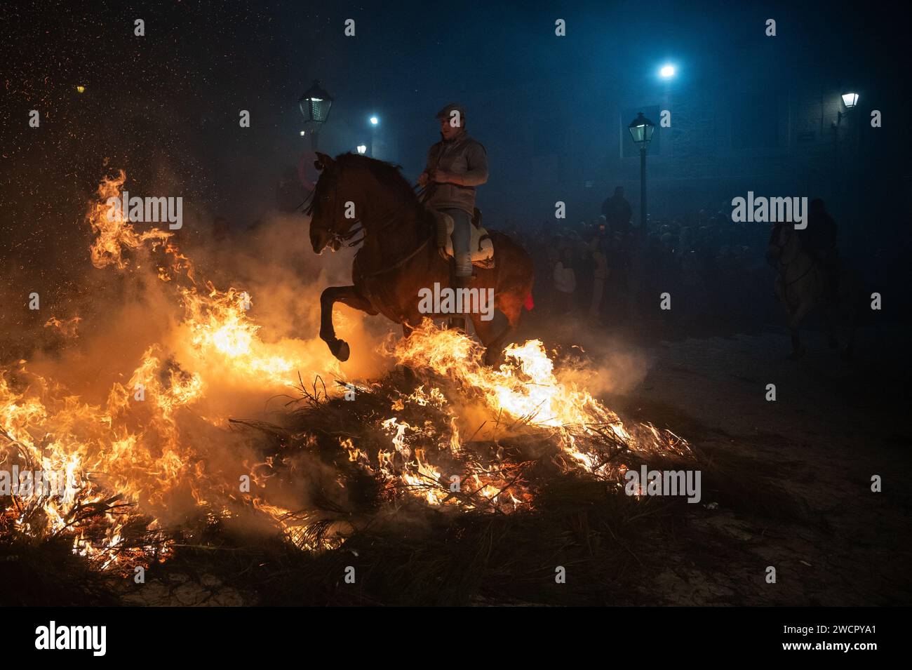 San Bartolome De Pinares, Spain. 16th Jan, 2024. A horse rider jumps ...