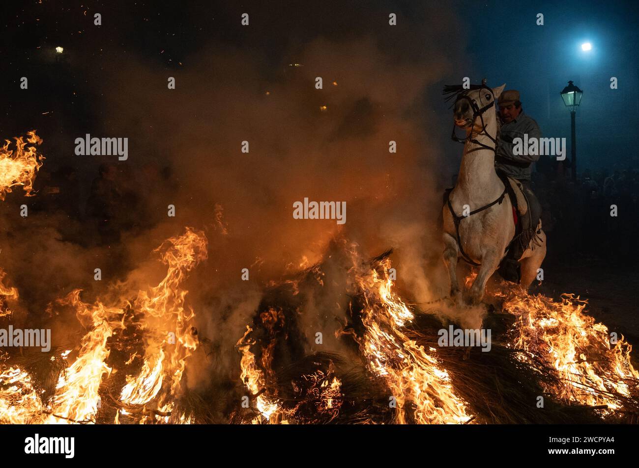 San Bartolome De Pinares, Spain. 16th Jan, 2024. A horse rider jumps ...