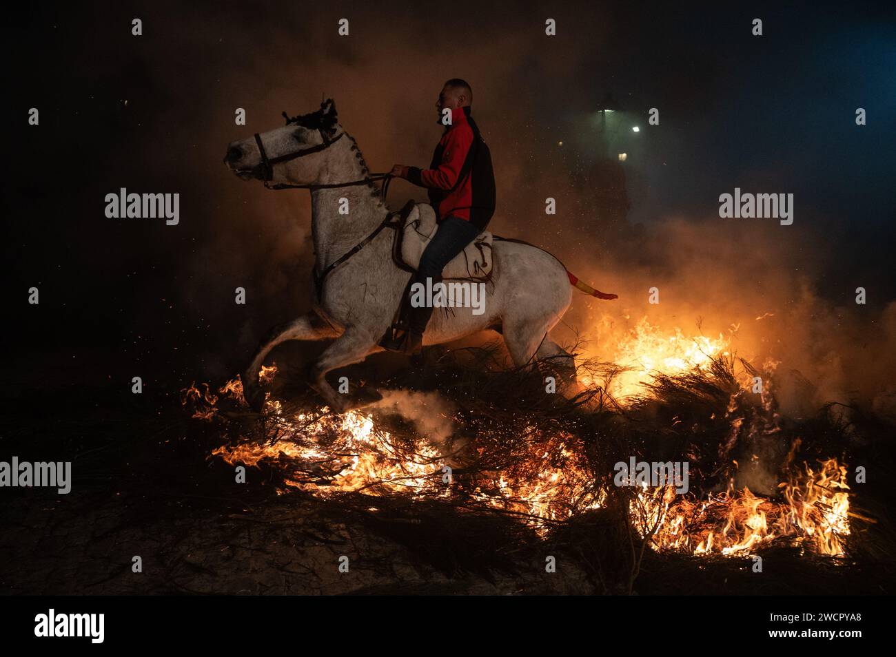 San Bartolome De Pinares, Spain. 16th Jan, 2024. A horse rider jumps ...
