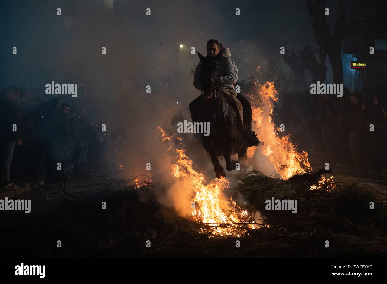 San Bartolome De Pinares, Spain. 16th Jan, 2024. A horse rider jumps ...