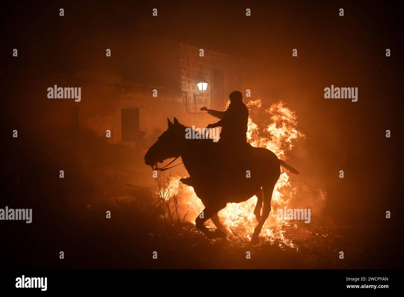 San Bartolome De Pinares, Spain. 16th Jan, 2024. A horse rider jumps ...