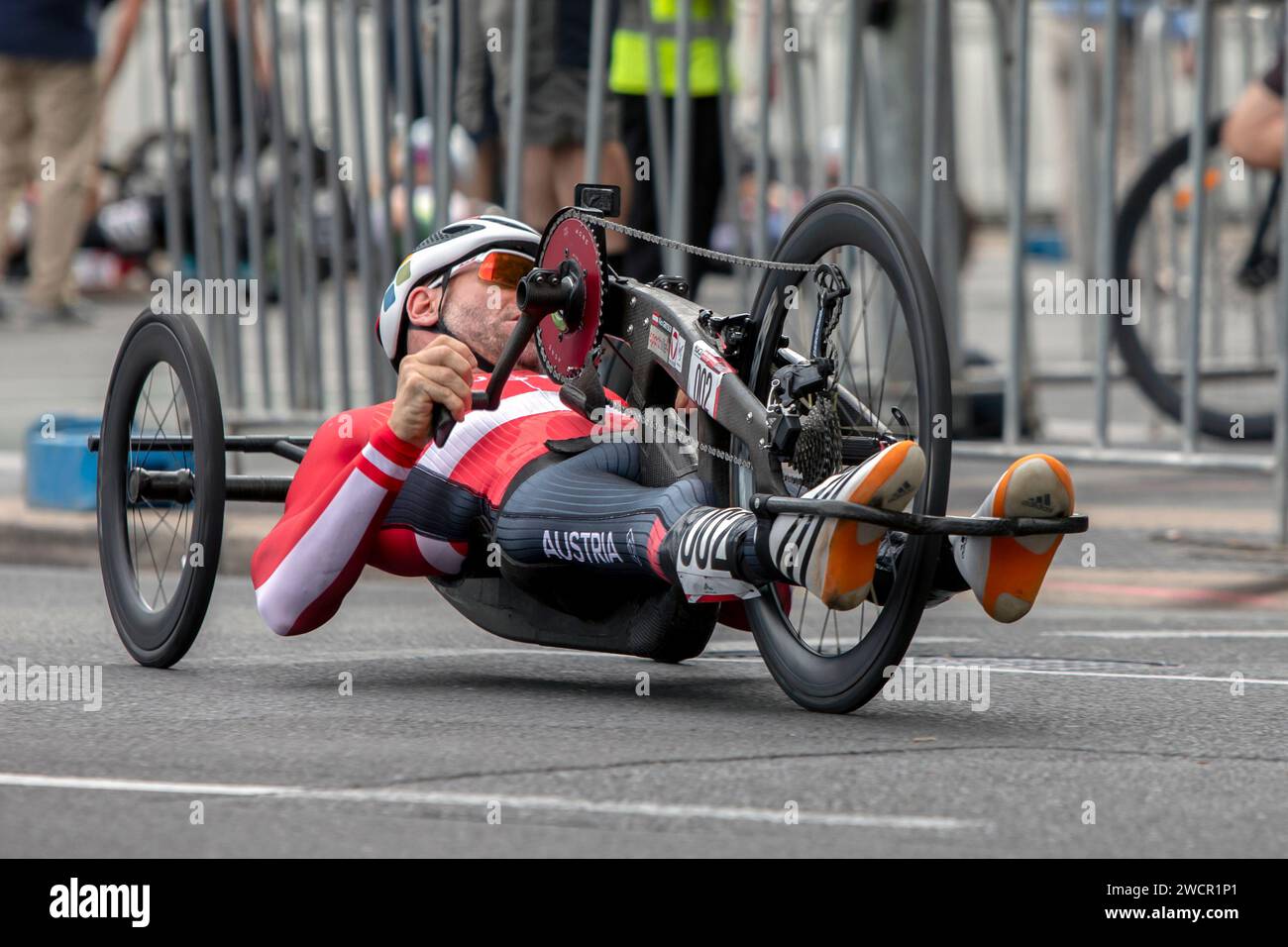 A Para Cyclist races a handcycle along Pulteney Street during the Down ...