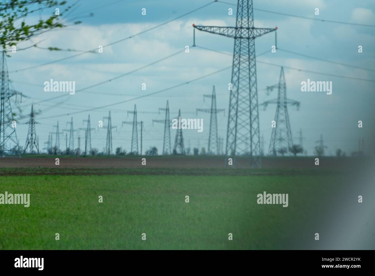 High voltage towers with sky background. Power line support with wires ...