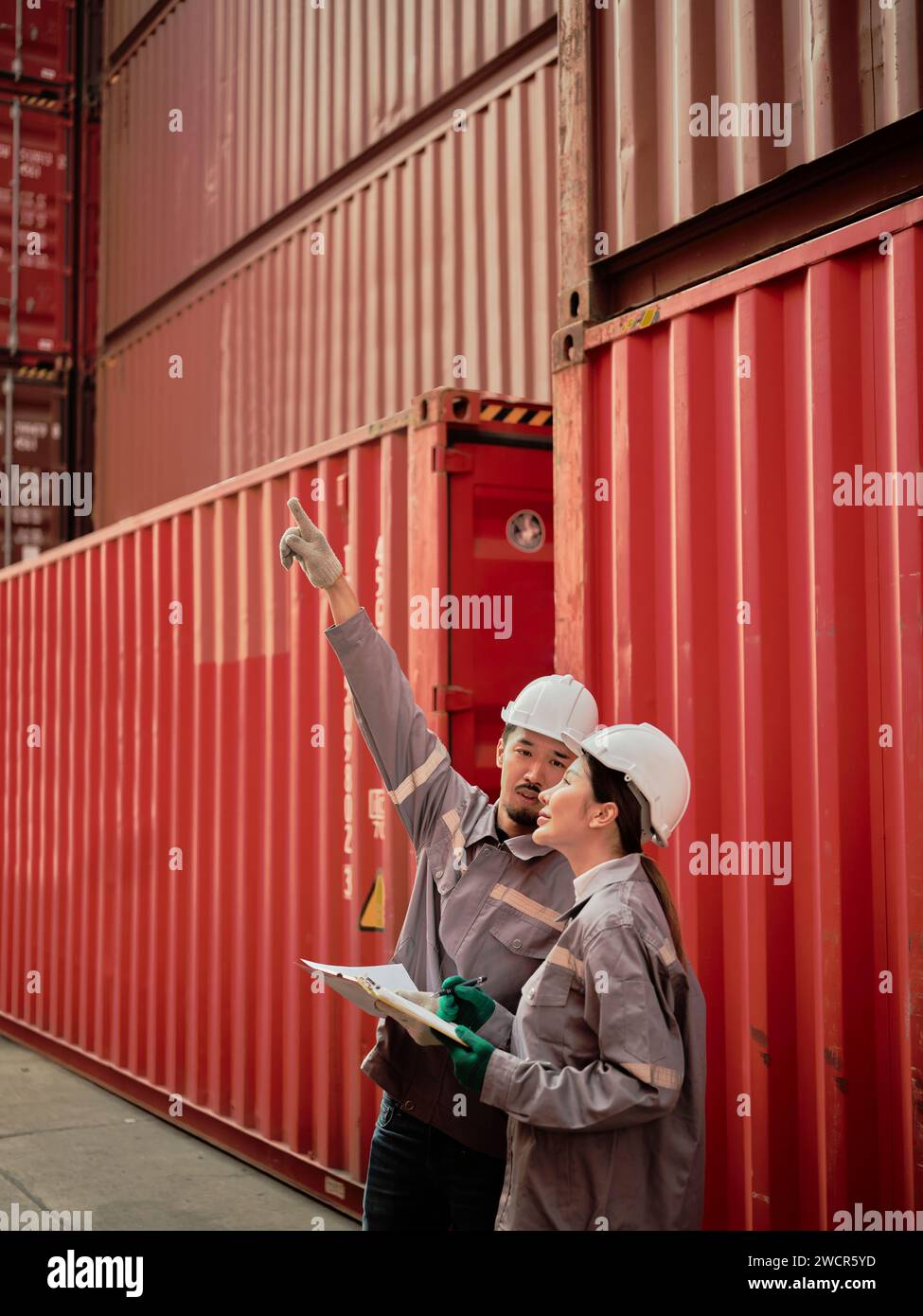 Engineer hand pointing taking Talk to the team at cargo store , Concept ...