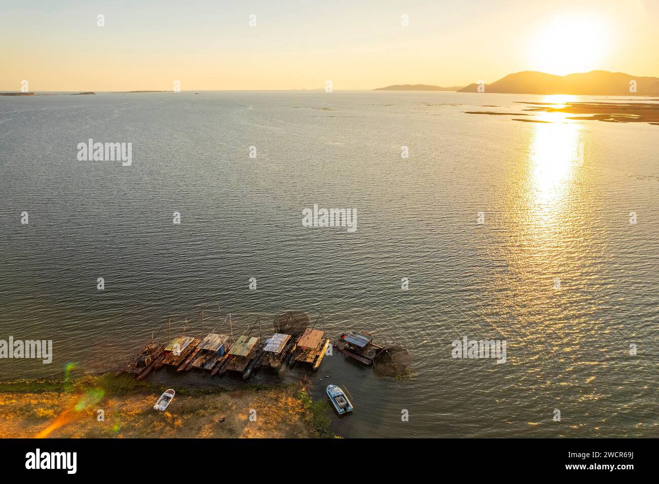 Kapenta fishing boats can be seen moored on Lake Kariba, Zimbabwe Stock ...