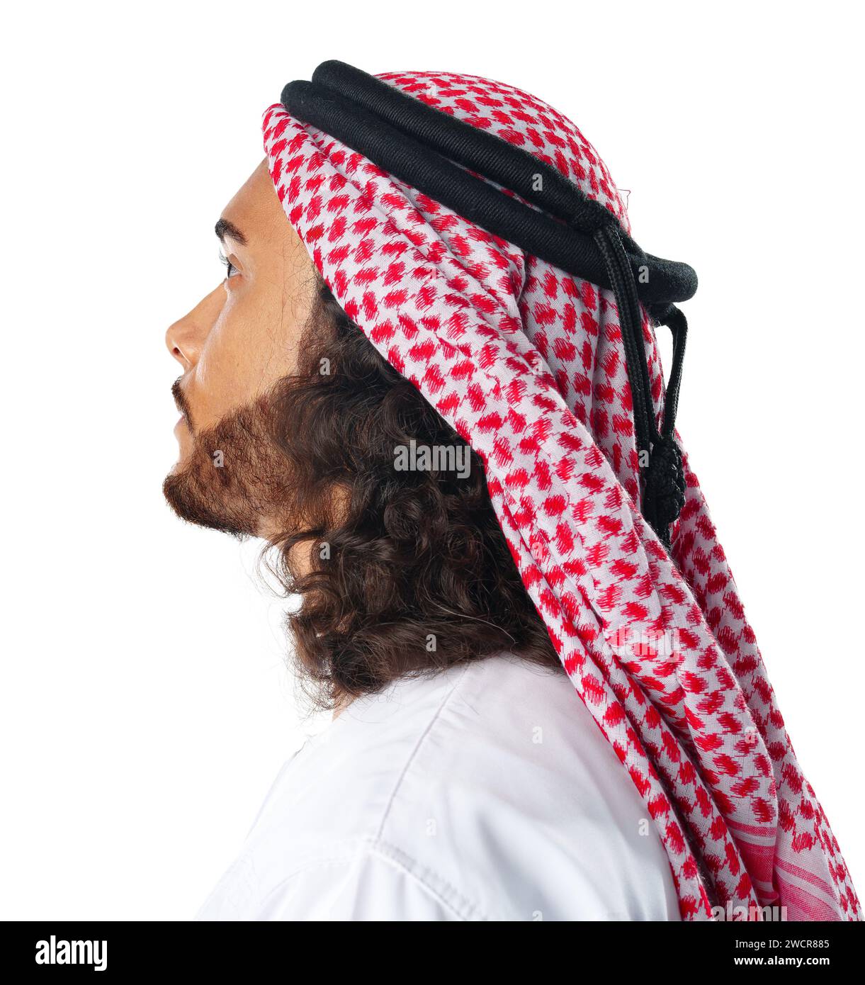 Side view of an Arab man standing on white isolated background Stock ...