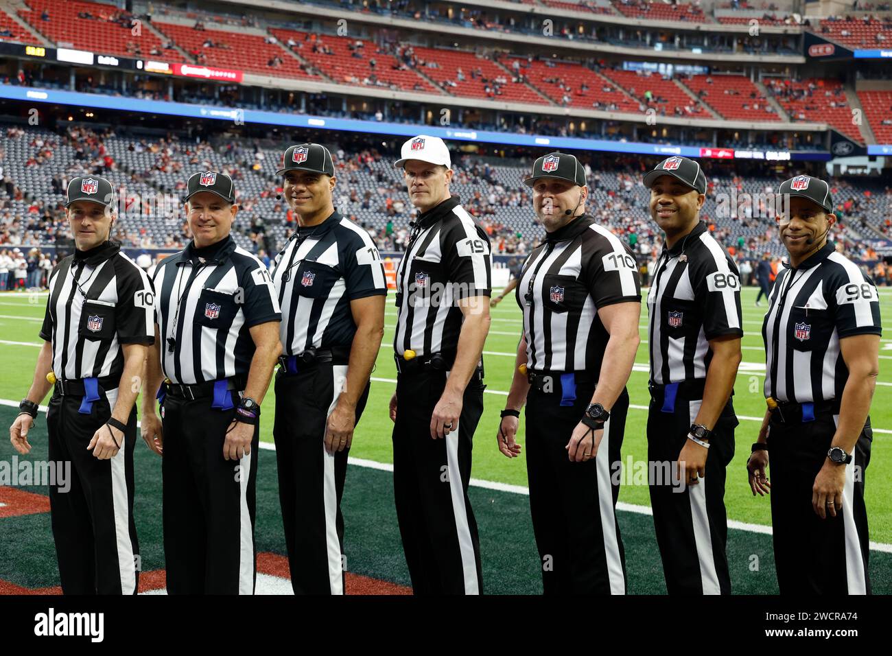 NFL game officials (L to R) side judge Dave Hawkshaw (107), back judge ...