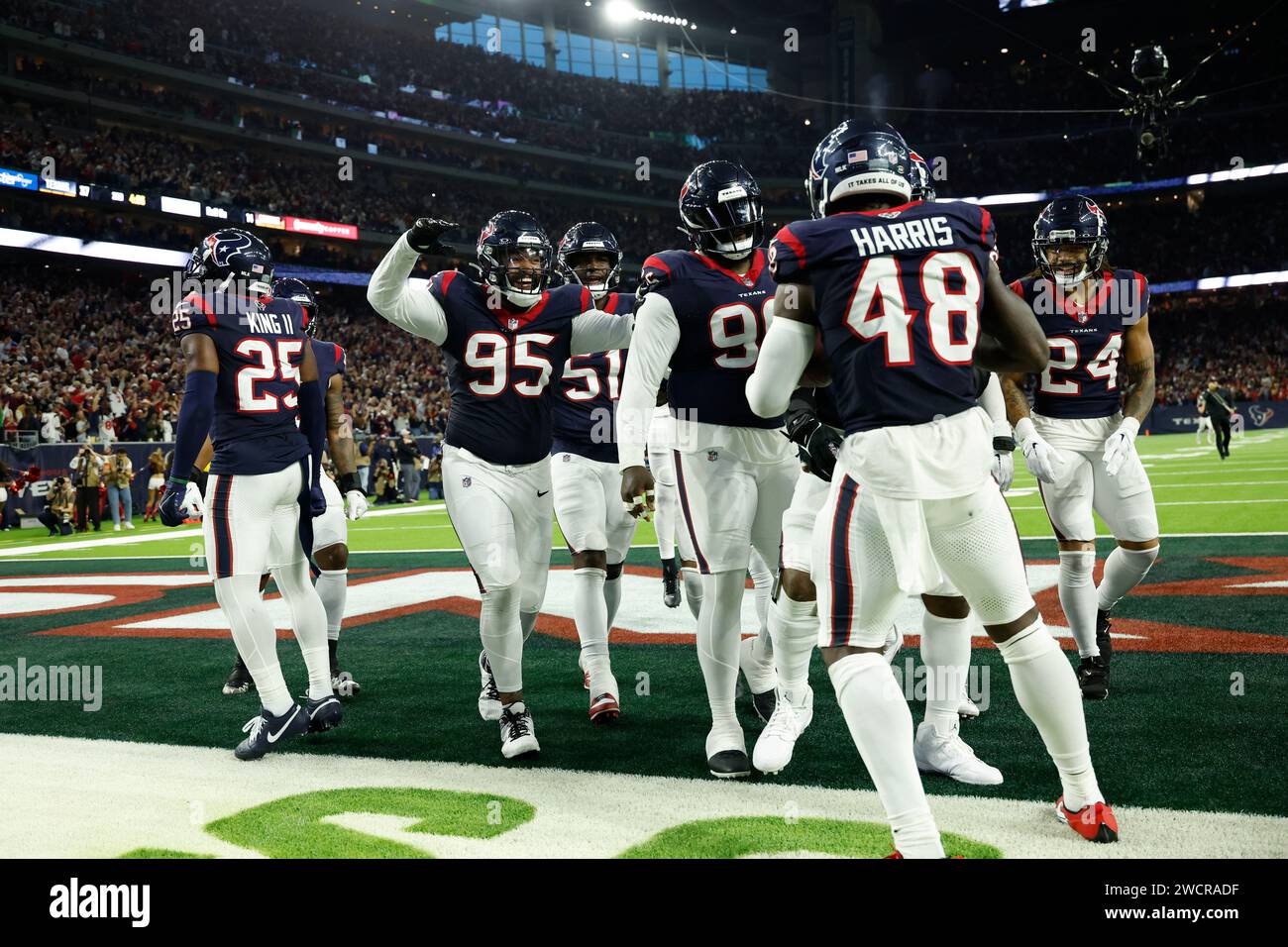 The Houston Texans players celebrate after linebacker Christian Harris ...