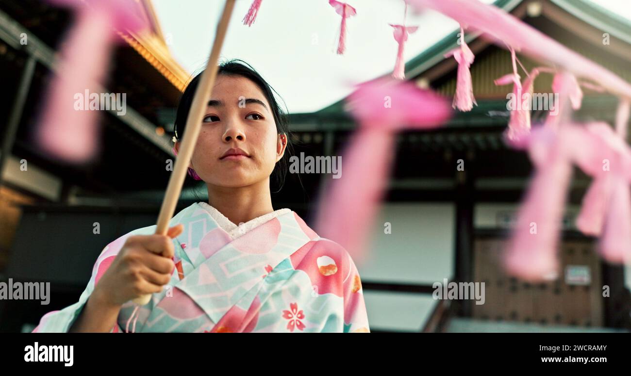 Asian, woman at temple and parasol, face with tradition and religion ...