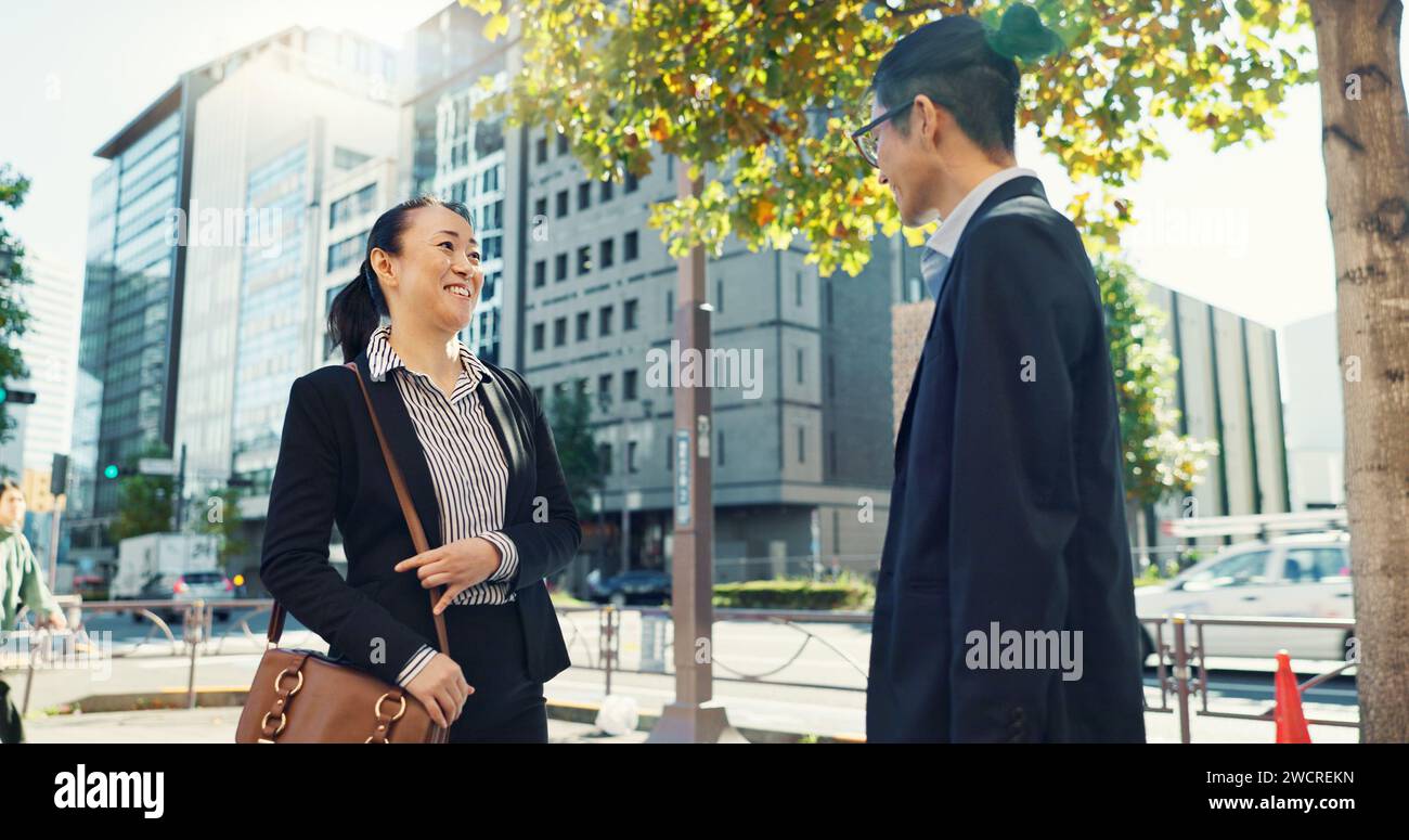 Business people, smile and greeting with meeting, bow and conversation ...