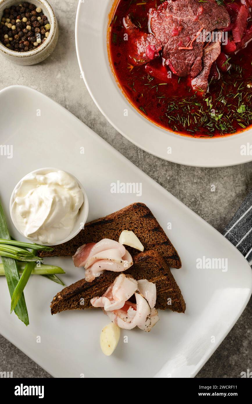 Russian lunch borscht with black bread Stock Photo - Alamy