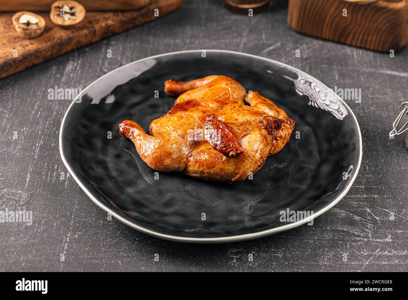 Grilled whole chicken side view hi-res stock photography and images - Alamy