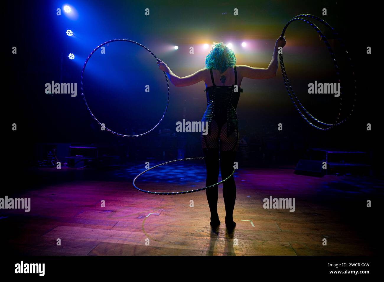 An artist works with hula-hoops during full dress rehearsals for the ...