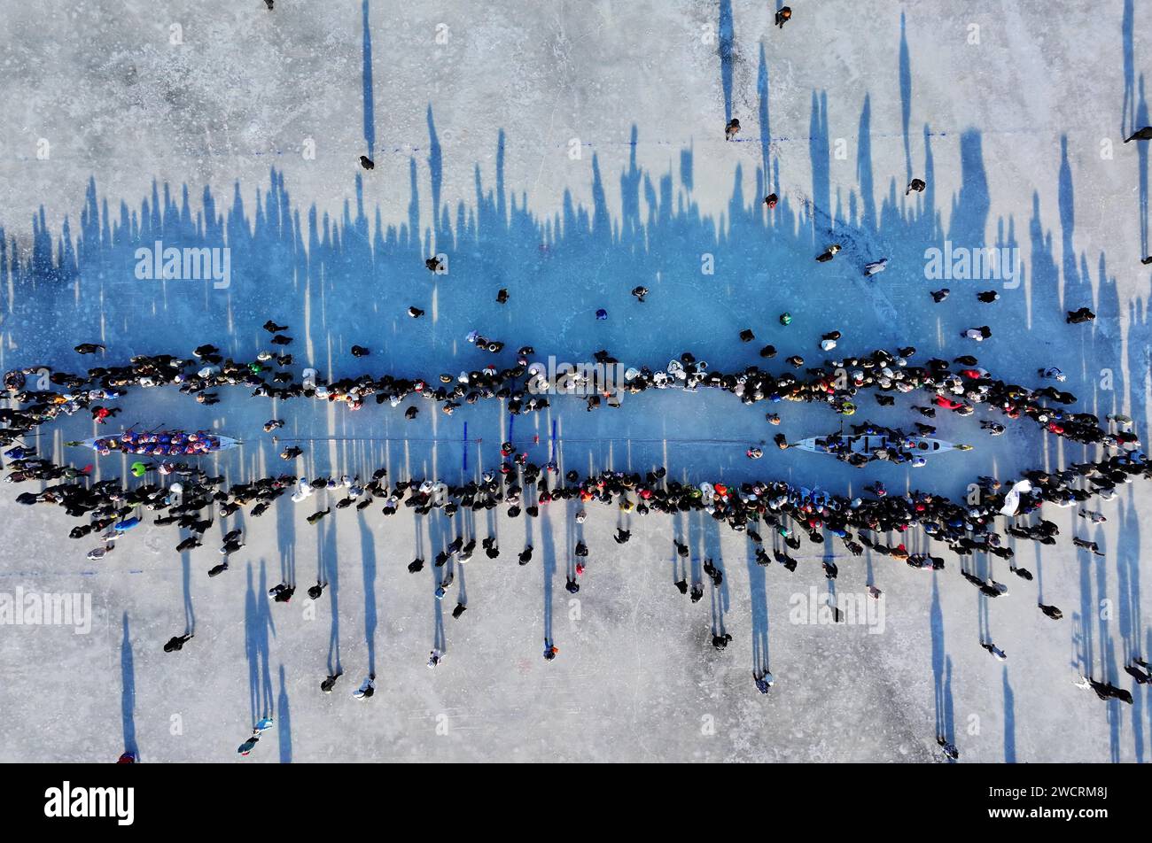 An ice dragon boat race on Songhua River draws tourists in Harbin City ...