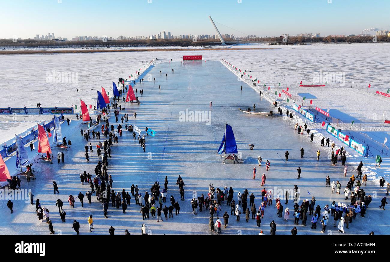 An ice dragon boat race on Songhua River draws tourists in Harbin City ...