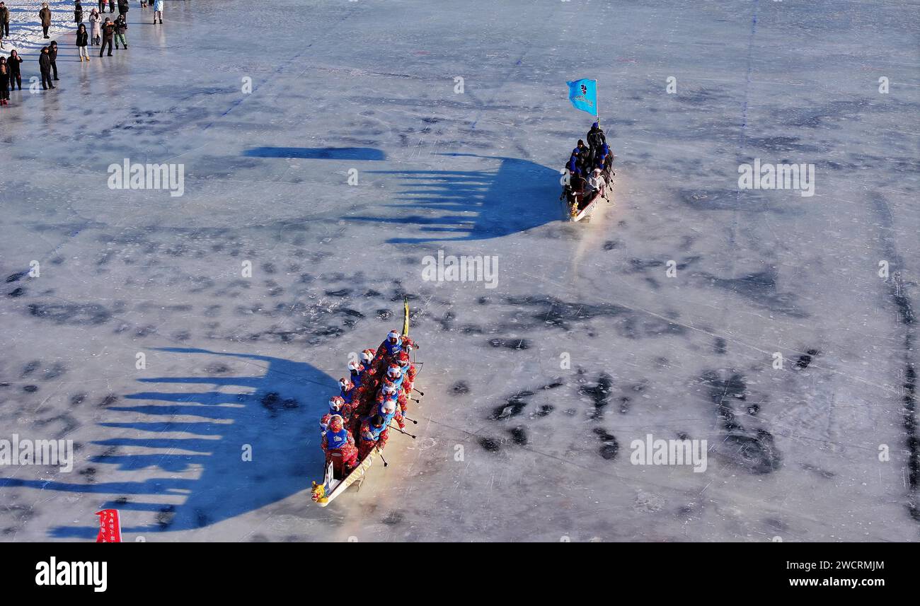 An ice dragon boat race on Songhua River draws tourists in Harbin City ...