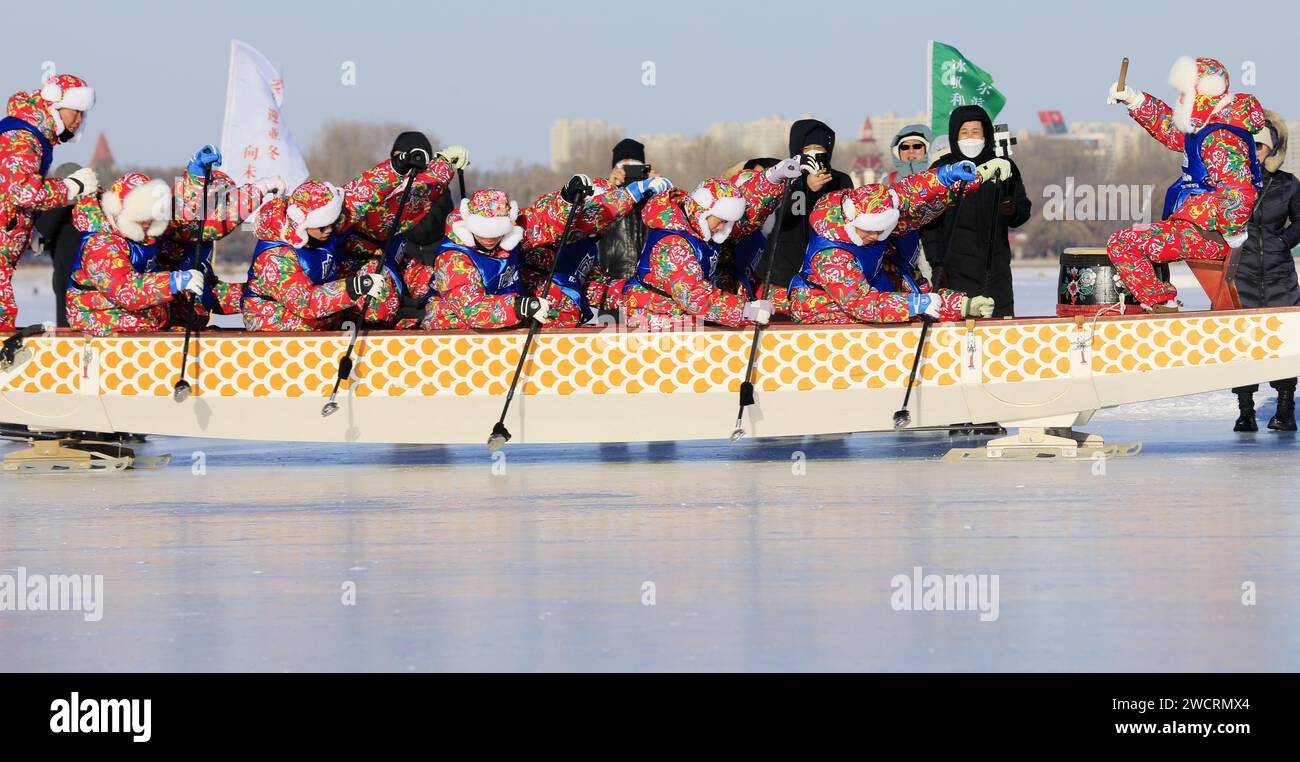 An ice dragon boat race on Songhua River draws tourists in Harbin City ...