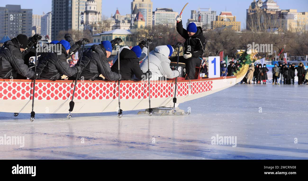 An ice dragon boat race on Songhua River draws tourists in Harbin City ...